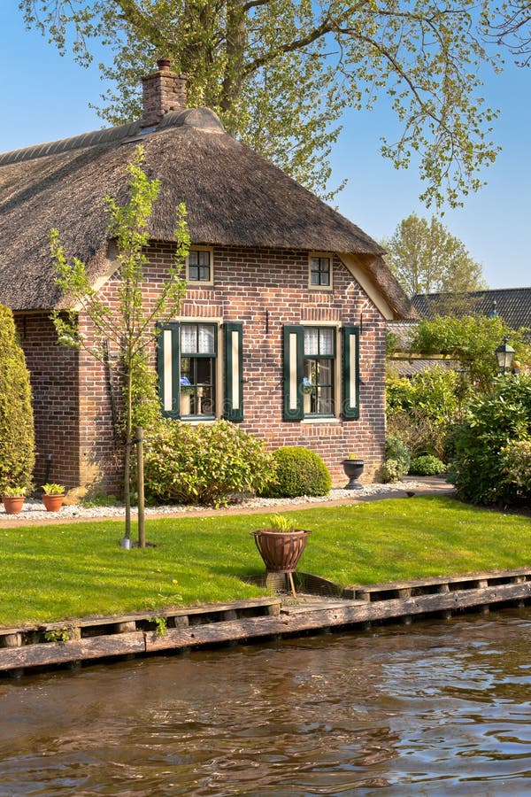Beautiful Traditional House with a Thatched Roof Stock Photo - Image of ...