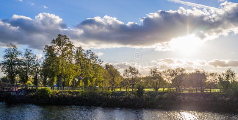 Beautiful Trees in the Park Near the River at Sunset in Windsor ...