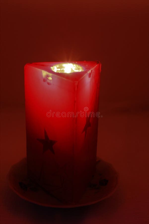 Beautiful Triangular Candle of Red Color. Stock Photo - Image of sides ...