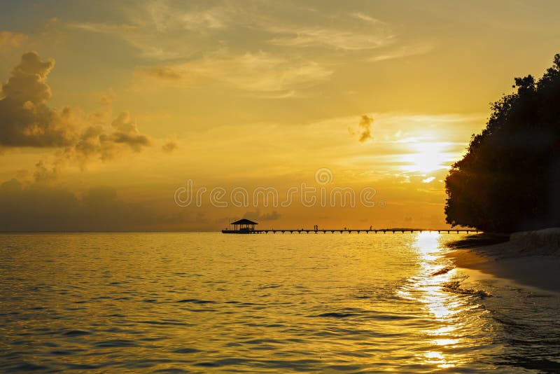 Beautiful tropical sunset stock photo. Image of reflection - 71837392