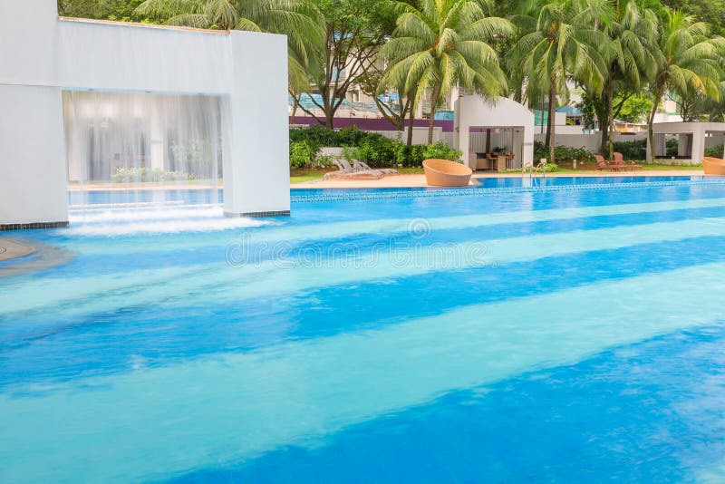 Beautiful Turquoise Swimming Pool with Large White Structure of Stock ...