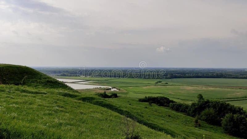 Beautiful Valley with Fields, Trees, Clouds in the Sky, View from the ...