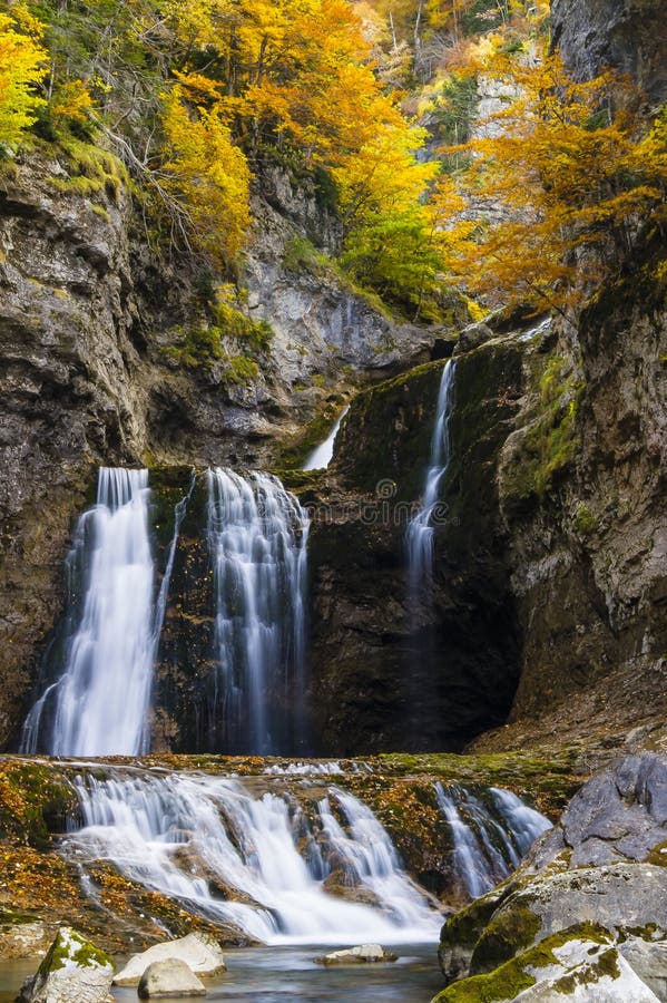 Beautiful Vertical Low Angle Shot of a Falls in the Middle of the ...