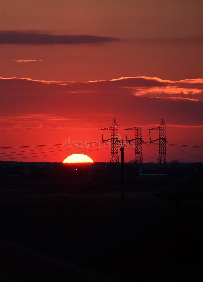 Beautiful Vertical Picture of a Mesmerizing Red Sunset Over the ...