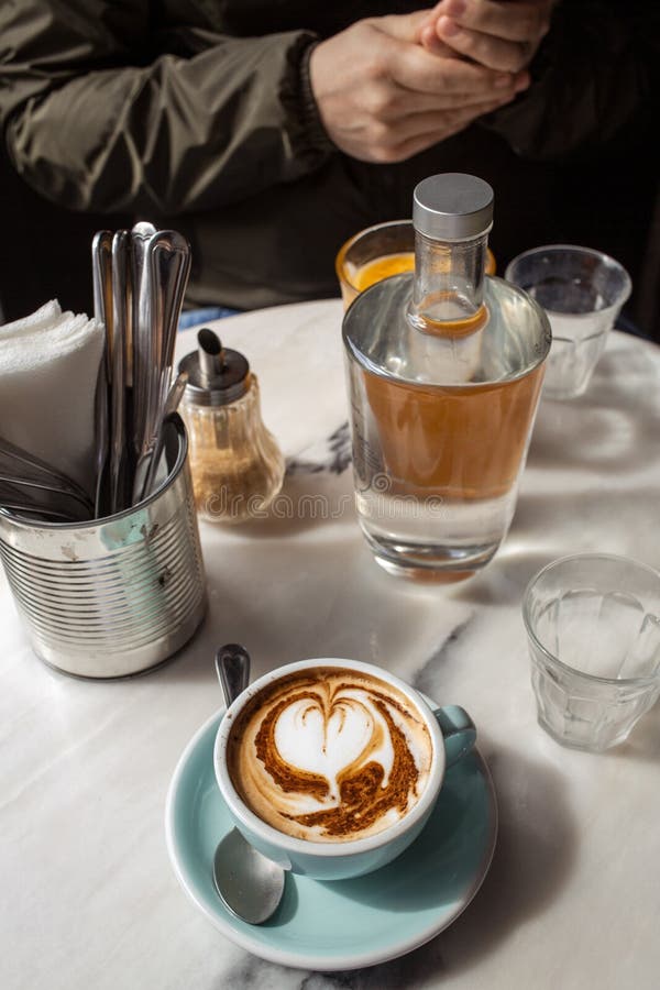 Beautiful Vertical Shot of a Cappuccino and a Table Full of Drinks ...