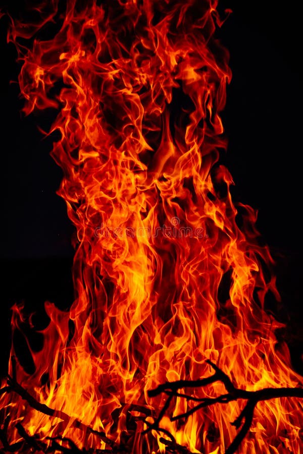 Beautiful Vertical Shot of a Large Burning Fire at Night Stock Image ...