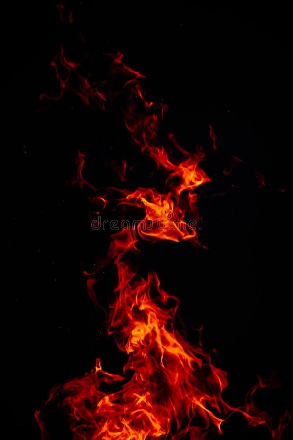 Beautiful Vertical Shot of a Large Burning Fire at Night Stock Photo ...
