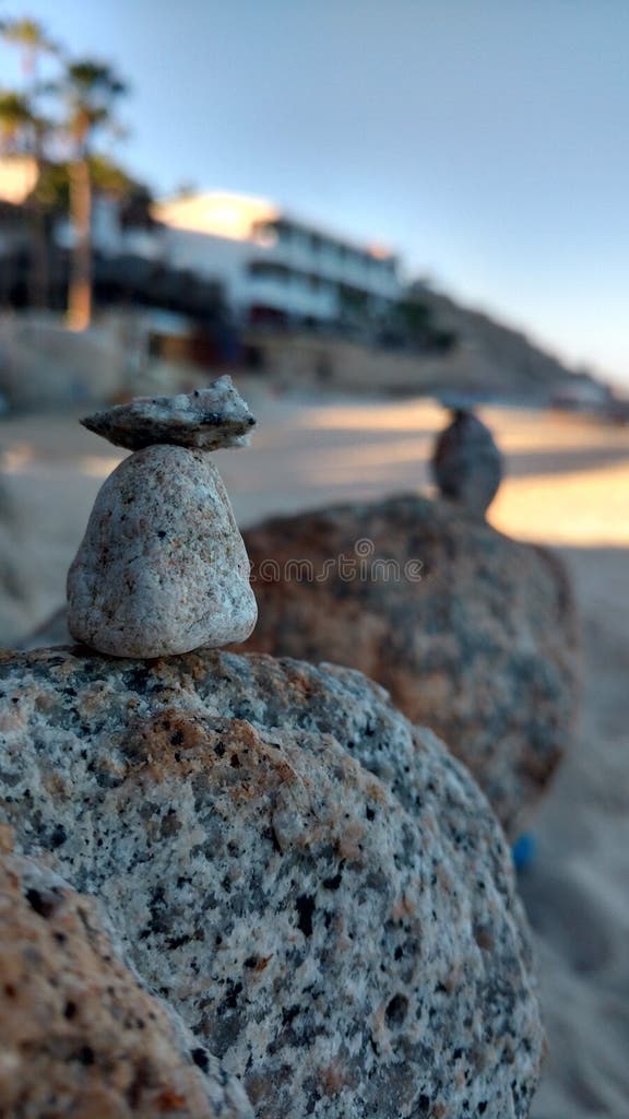 Beautiful Vertical Shot of a Rock Balancing at the Beach Stock Photo ...