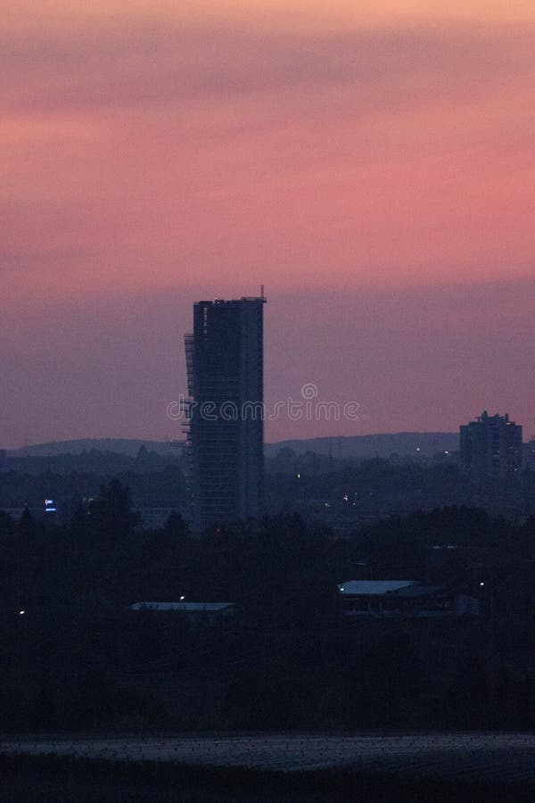 Beautiful Vertical Shot of a Tall Skyscraper Building in the Dusk Stock ...