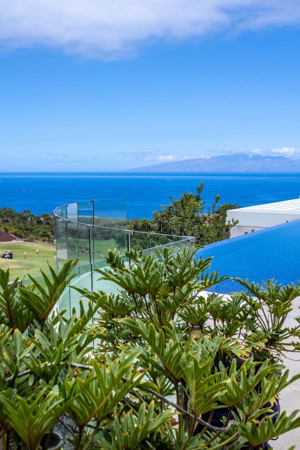 Beautiful Vertical View of a Resort Pool before the Seascape Under the ...