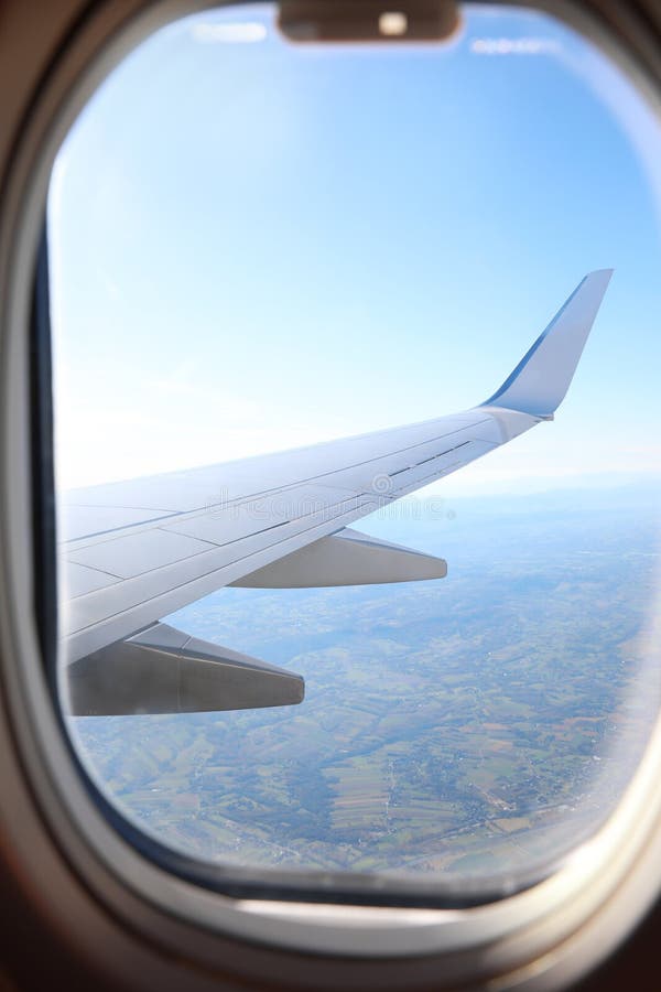 Beautiful View Through Airplane Window. Traveling Abroad Stock Photo ...