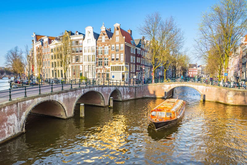 Beautiful View of Amsterdam Canals with Bridge and Typical Dutch ...