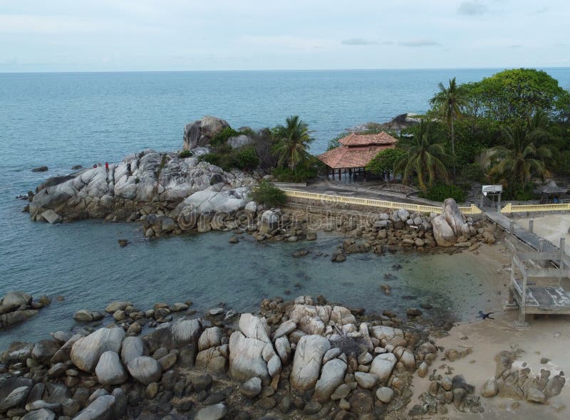 Beautiful View of the Beach with Expanse of Rocks and Blue Water Stock ...