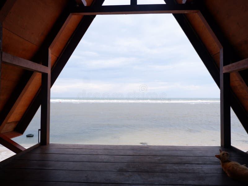 Beautiful View of the Beach from Inside a Wooden House or Gazebo Stock ...