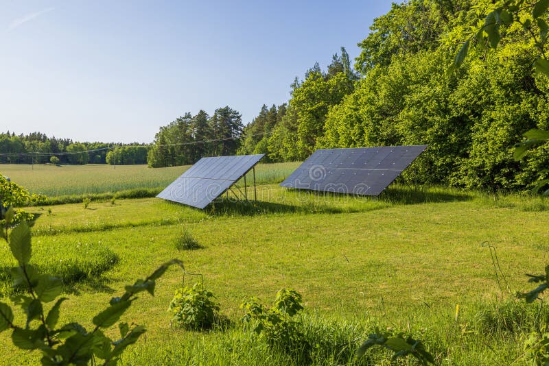 View of Big Solar Panels Installed on Ground. Stock Image - Image of ...