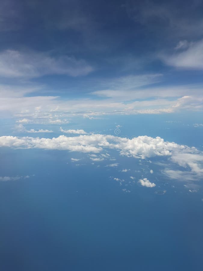 Beautiful View of Blue Ocean, White Clouds, and Blue Sky, Captured from ...