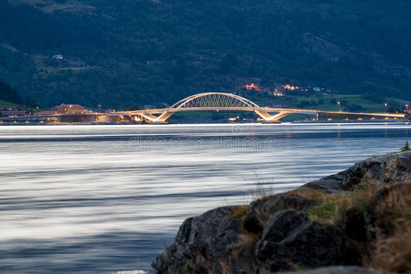 Beautiful View of a Bridge Over the River with Dense Green Forest in ...