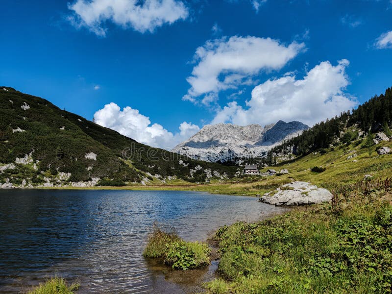 Beautiful View of a Calm Lake with Mountains in the Background Stock ...