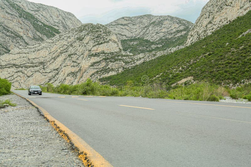 Beautiful View of Car on Asphalt Highway in Mountains. Road Trip Stock ...