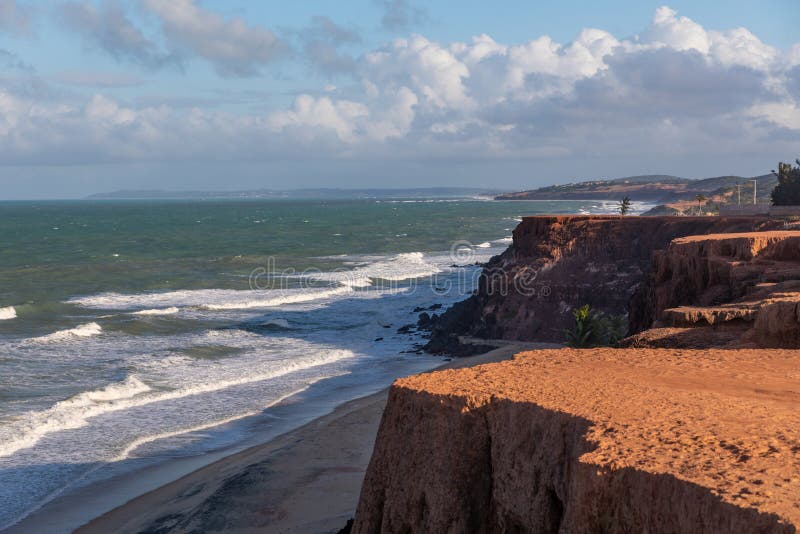 Beautiful View of the Cliffs Over the Ocean Under the Cloudy Sky ...