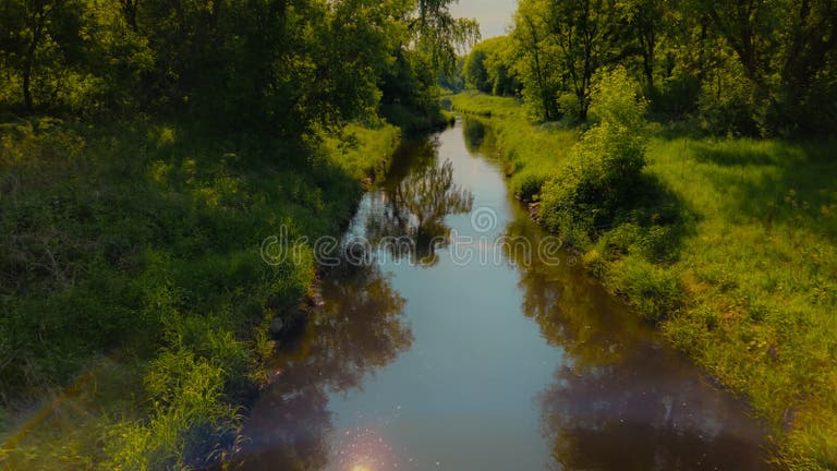 A Beautiful View of a Creek in Spring in Linear Perspective with the ...