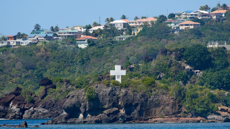 Beautiful View of a Cross on a Cliff with Small Houses Stock Photo ...