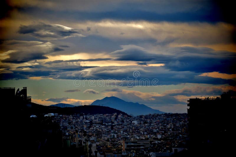 Beautiful View Down on the City, Clouds and Mountains Stock Photo ...