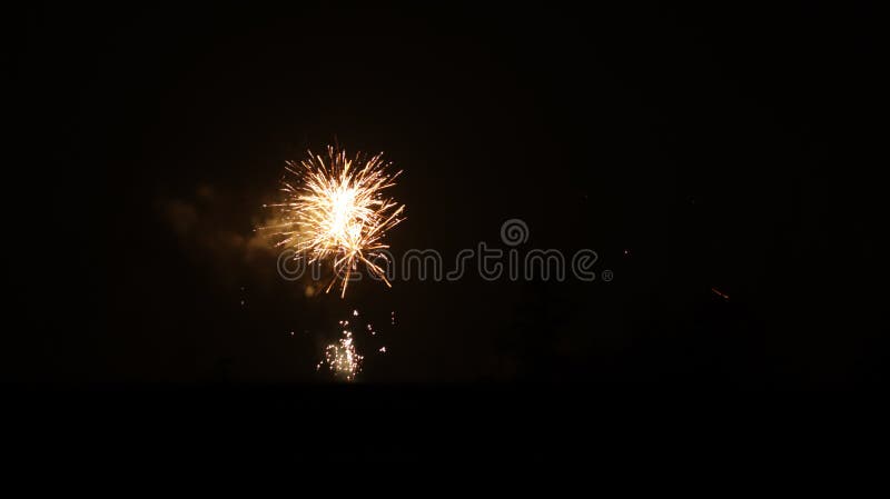 Beautiful View of Exploding Gold Fireworks in a Black Sky Stock Image ...