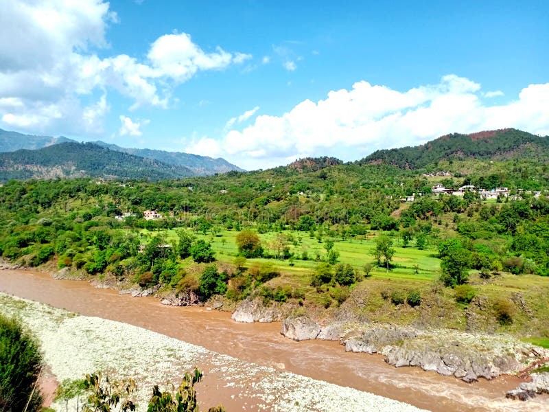 A Beautiful View of Flood in River and Mountains Stock Photo - Image of ...