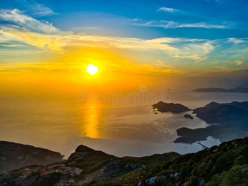 Beautiful View of Golden Hour Sunset with Paragliders Stock Image ...