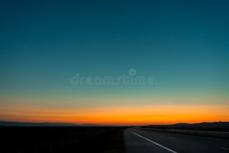 Beautiful View of a Highway with the Breathtaking Colorful Sky in the ...