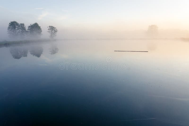 Beautiful View of a Lake Covered in Fog. Stock Photo - Image of ...