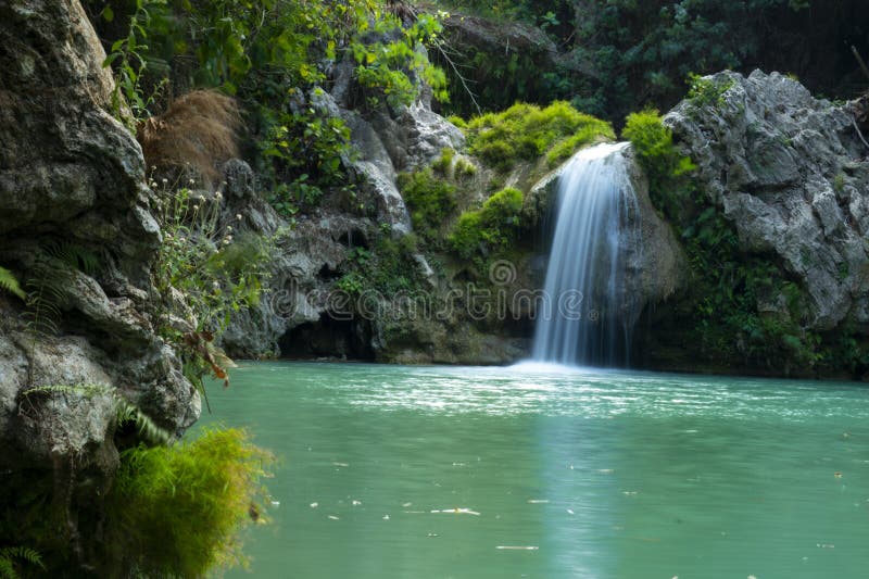Beautiful View of Low Waterfall Falling into a Pool with Turquoise ...