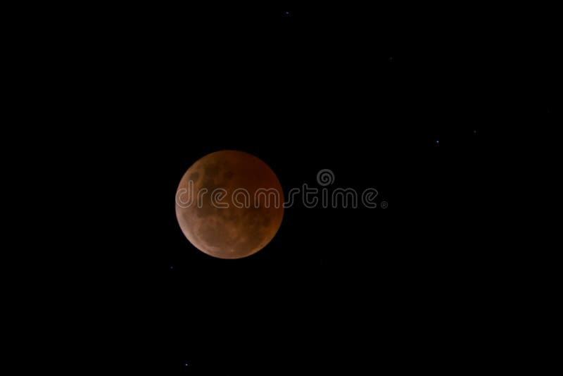 Beautiful View of a Lunar Eclipse Full Totality on a Black Background ...