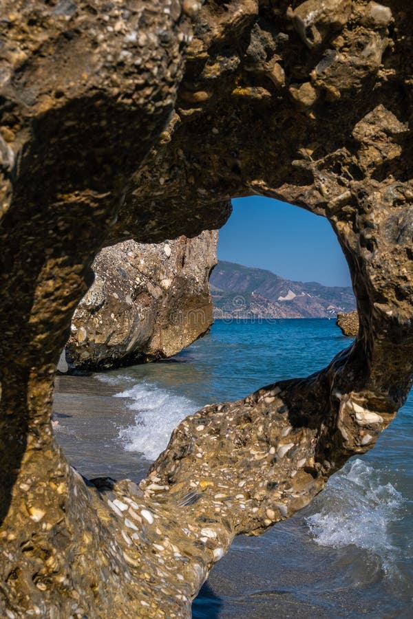Beautiful View of the Mediterranean Sea through Rock Formations at ...