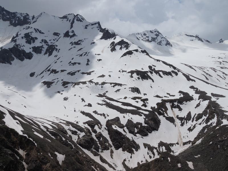 Beautiful View of the Melting Snows of Mount Cheget in Summer Stock ...