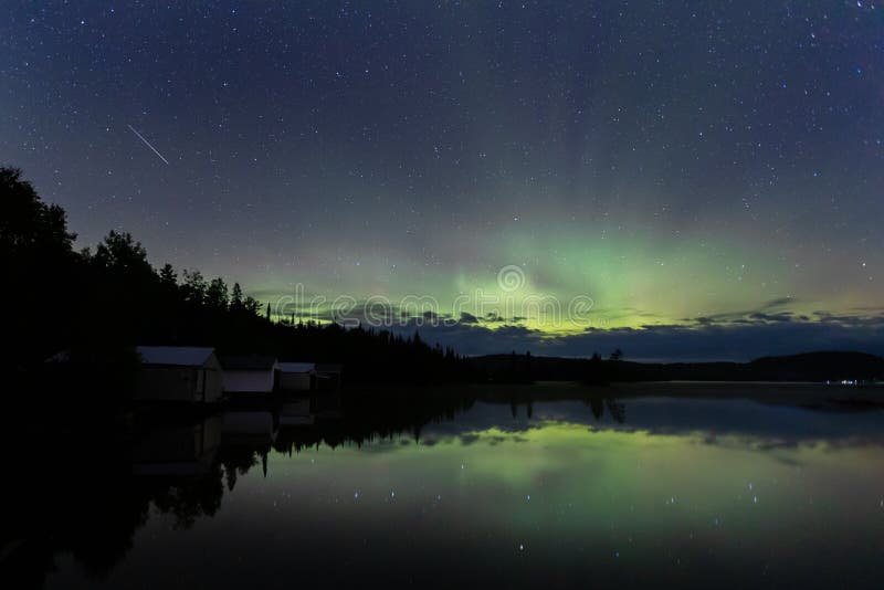 Beautiful View of Northern Lights Reflecting in the Lake. Stock Photo ...