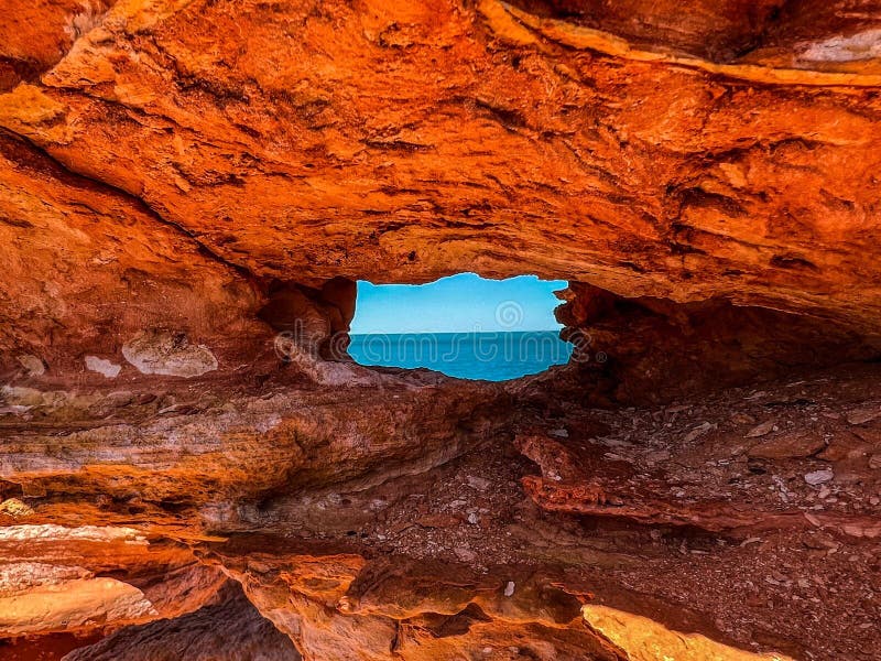 Beautiful View of Ocean Water Seen through a Rock Stock Photo - Image ...
