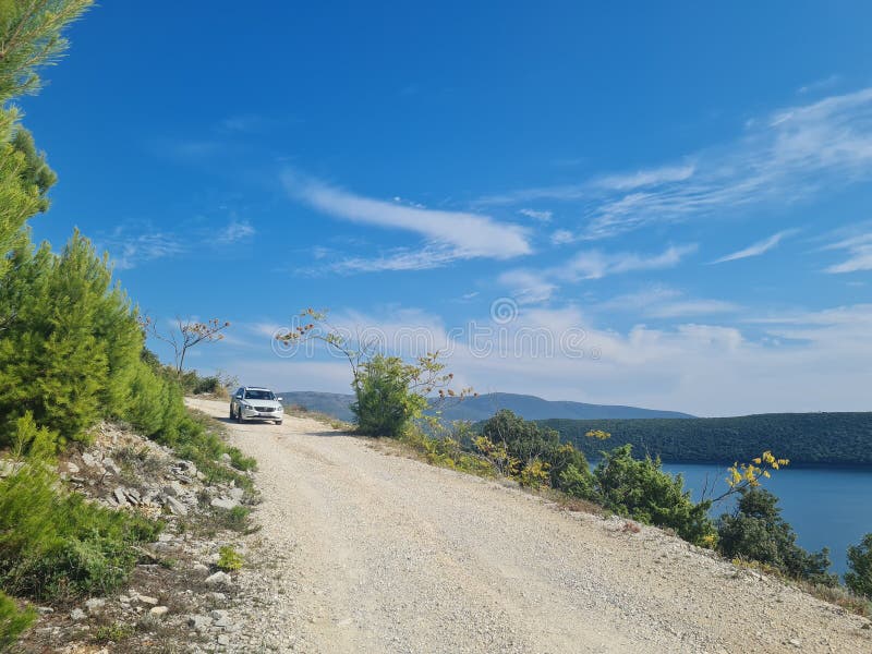 Beautiful View of an Old Road with a Blue Sky and Sea in the Background ...