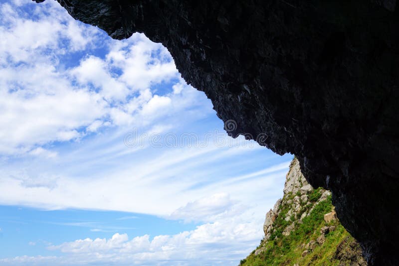 View from the Cave To the Mountains, Sky and Clouds Stock Photo - Image ...