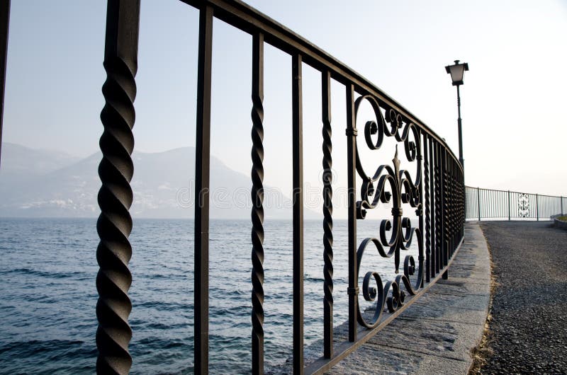 Beautiful View of the Pier with Black Handrailings by the Calm and ...