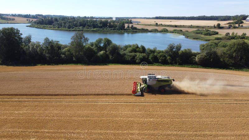 Beautiful View of a Plowing Field and Lake with Trees Editorial Photo ...