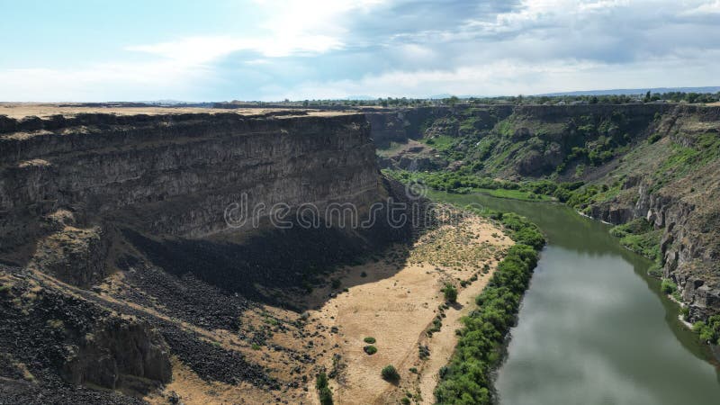 Beautiful View of a River Surrounded by Geological Formations with ...