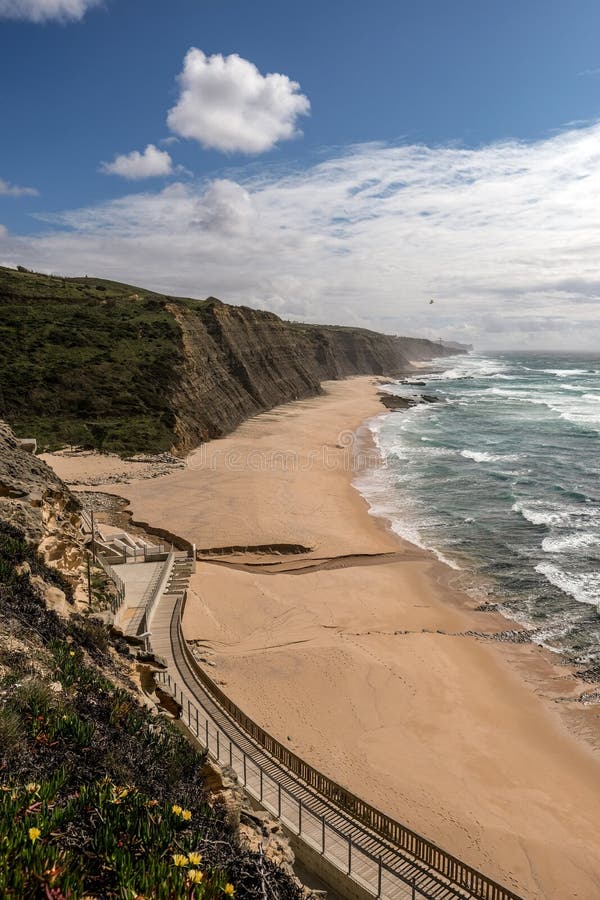 Beautiful View of Sandy Beach with a Pathway on the Cliff Stock Photo ...