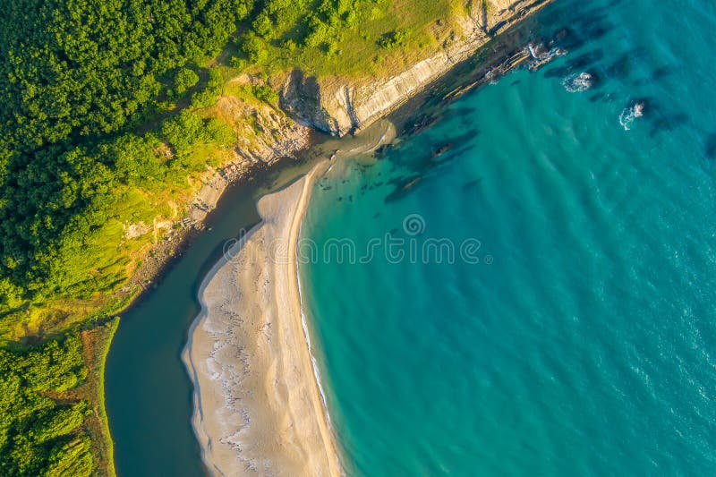 Picturesque Rocky Coastline with Sandy Beaches and Green Forests Stock ...