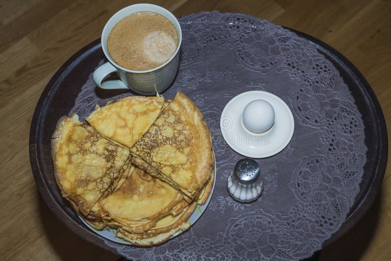 Beautiful View of Side Table Served with Pancakes , Cooked Egg and Cup ...
