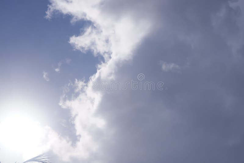 A Beautiful View of a Sky with a Huge White Cloud and Sun Stock Image ...