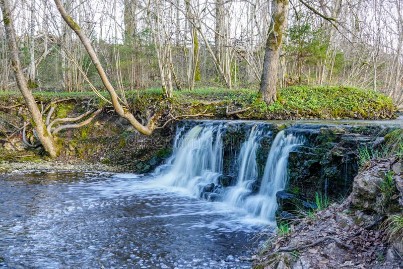 Beautiful View in Spring of a Waterfall in a Small River Stock Photo ...