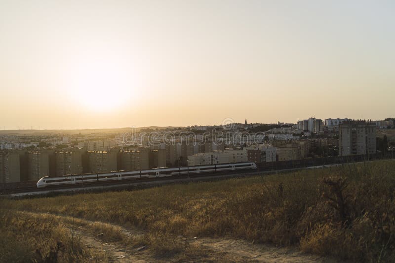 Beautiful View of Subway Train with Buildings on the Back during ...