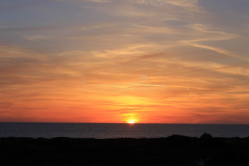 Beautiful View of the Sun in the Sky and the Horizon during the Sunset ...